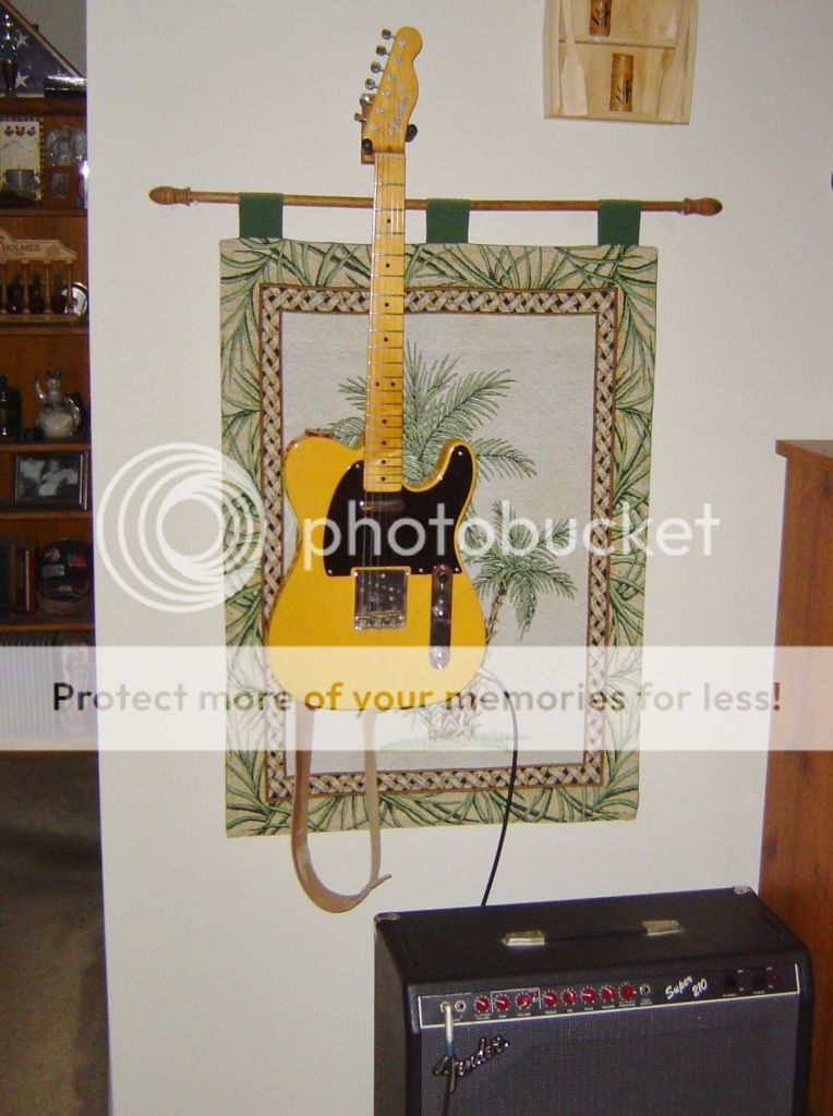 Heavy guitars (like a tele) hanging by the neck... | Page 2 ...